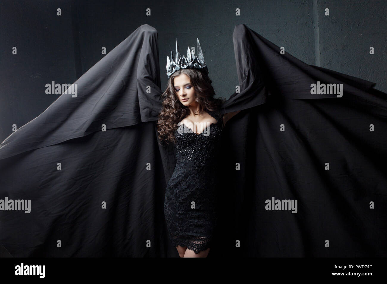 Portrait of a Gothic Princess. Beautiful young brunette woman in metal ...