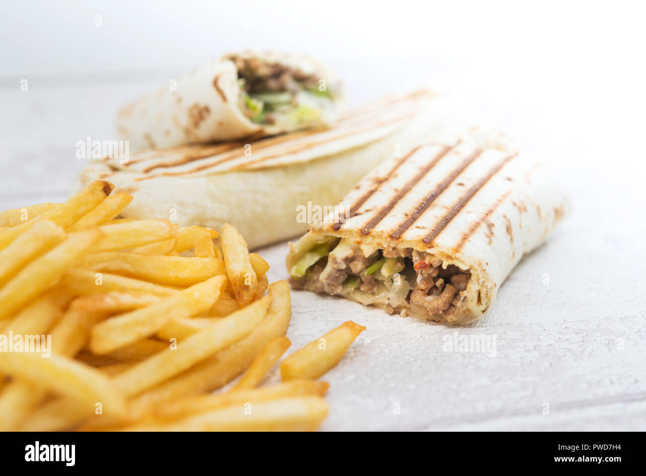beef tacos served with golden French fries Stock Photo - Alamy
