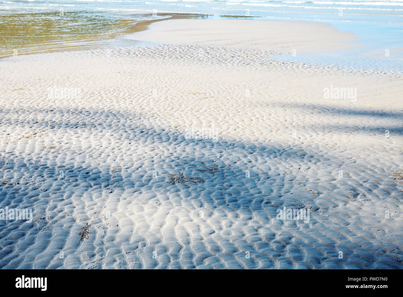 Shadow on beach with texture background Stock Photo - Alamy