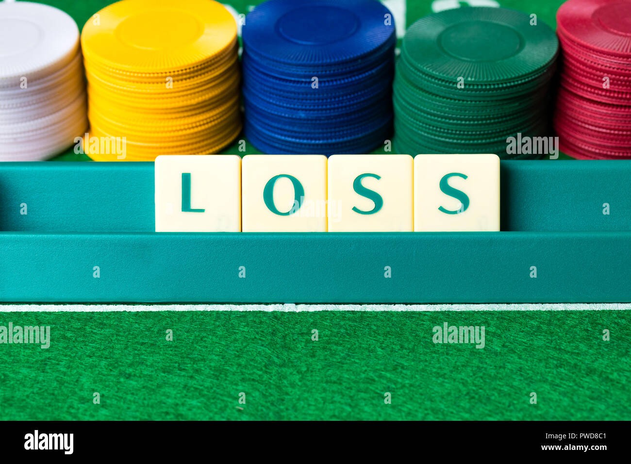 Gambling addiction abstract concept. Loss made out of letter tiles ...