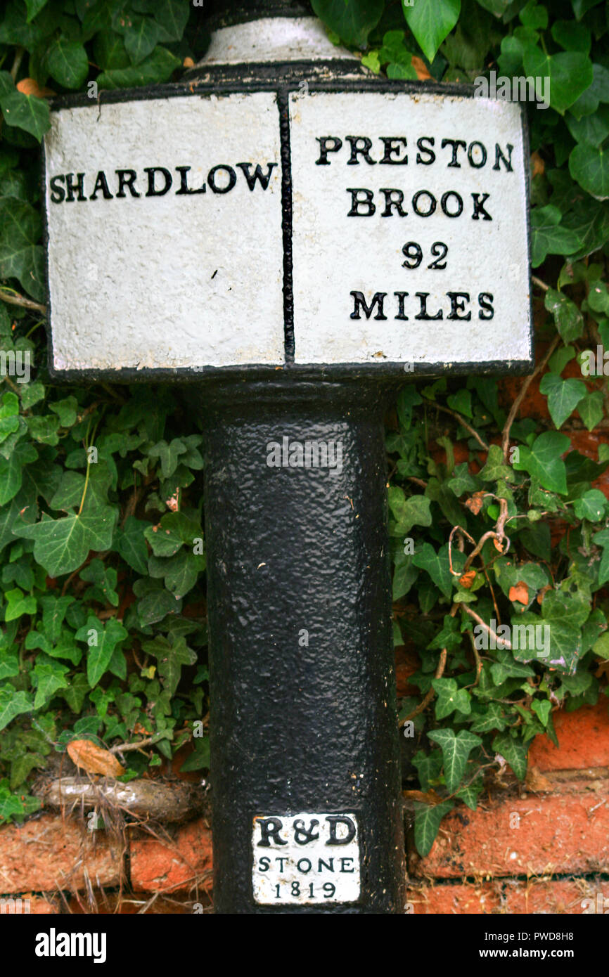 Milestone distance marker at the start of the Trent and Mersey canal at ...
