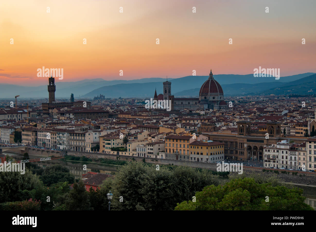 The view of Florence, Italy at sunset from Piazzale Michelangelo in the ...