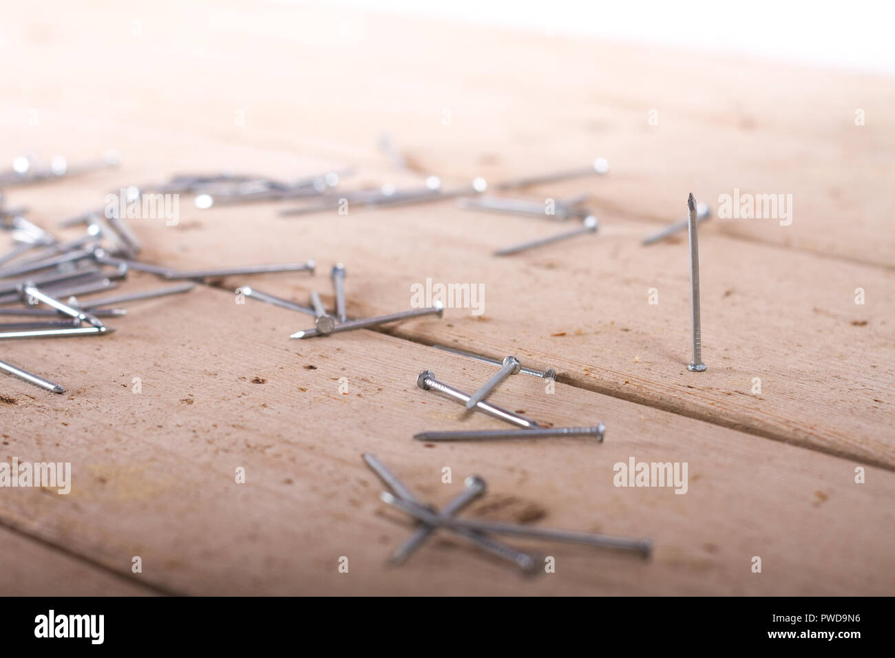 wooden hardware nails on rough surface Stock Photo - Alamy