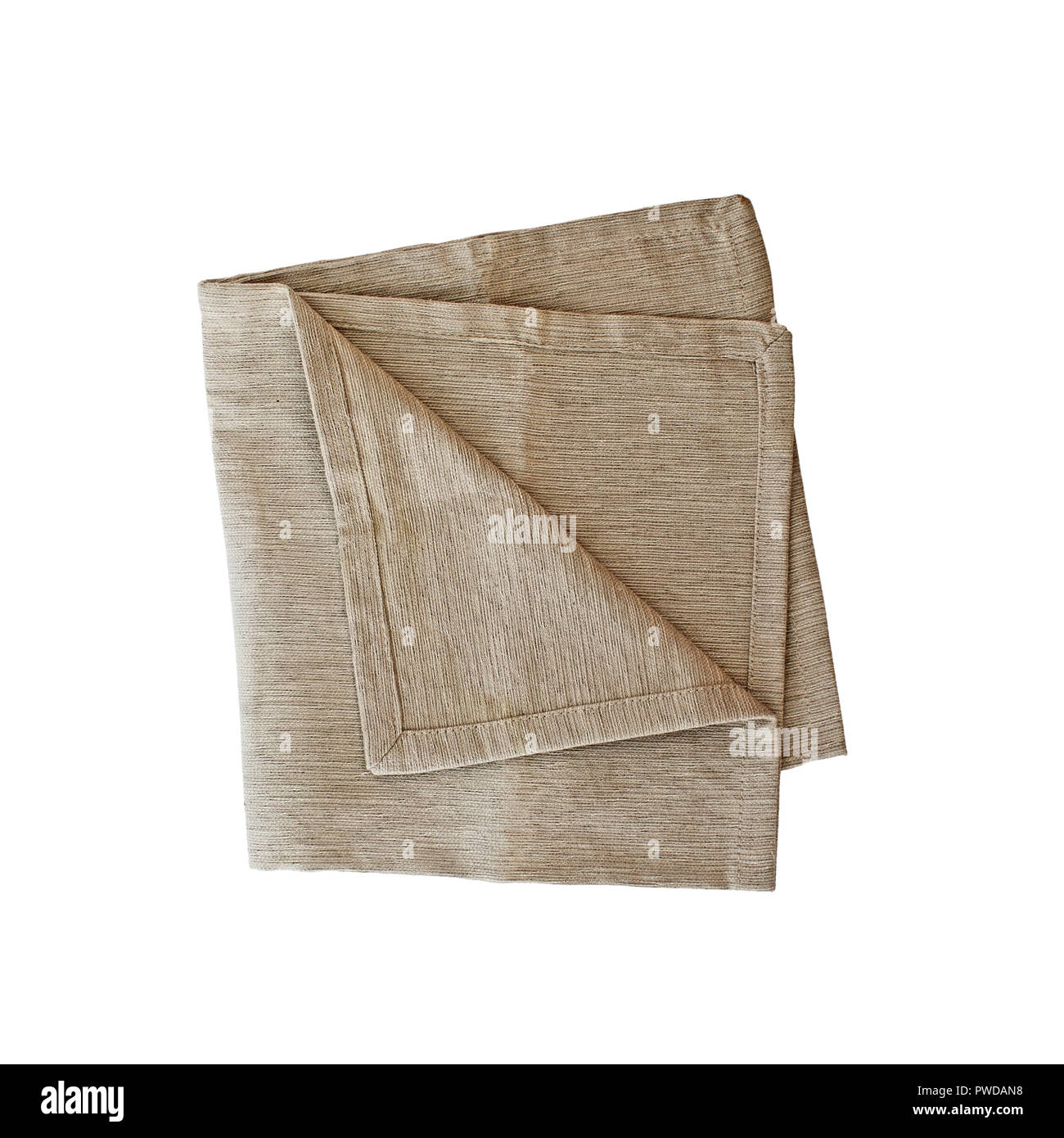Folded linen napkin isolated over a white background with clipping path ...