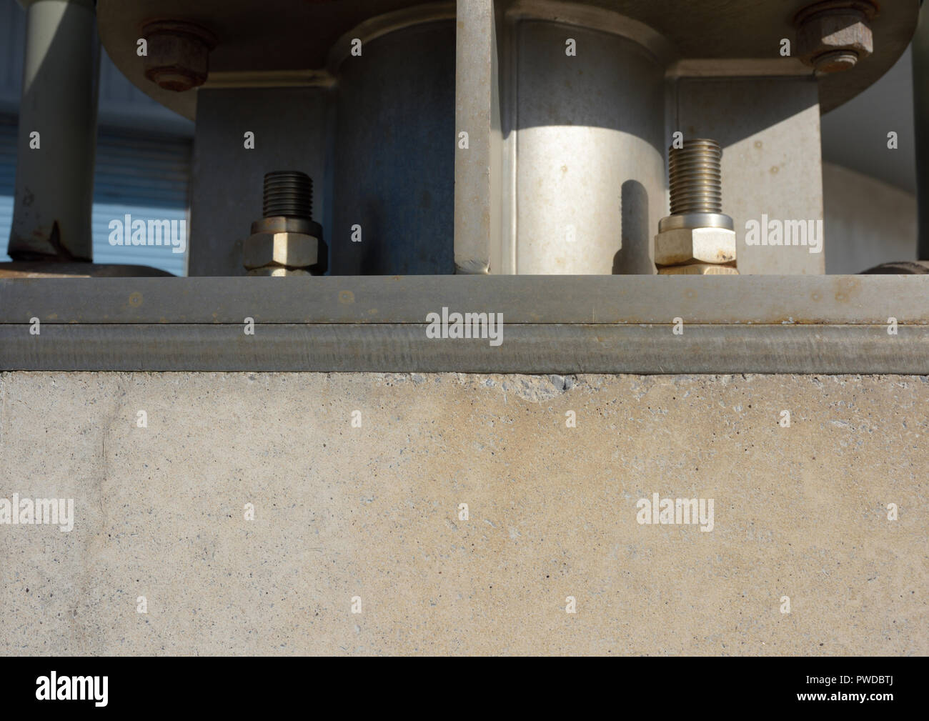 Stainless steel mounting plate fixed to concrete with stainless steel ...