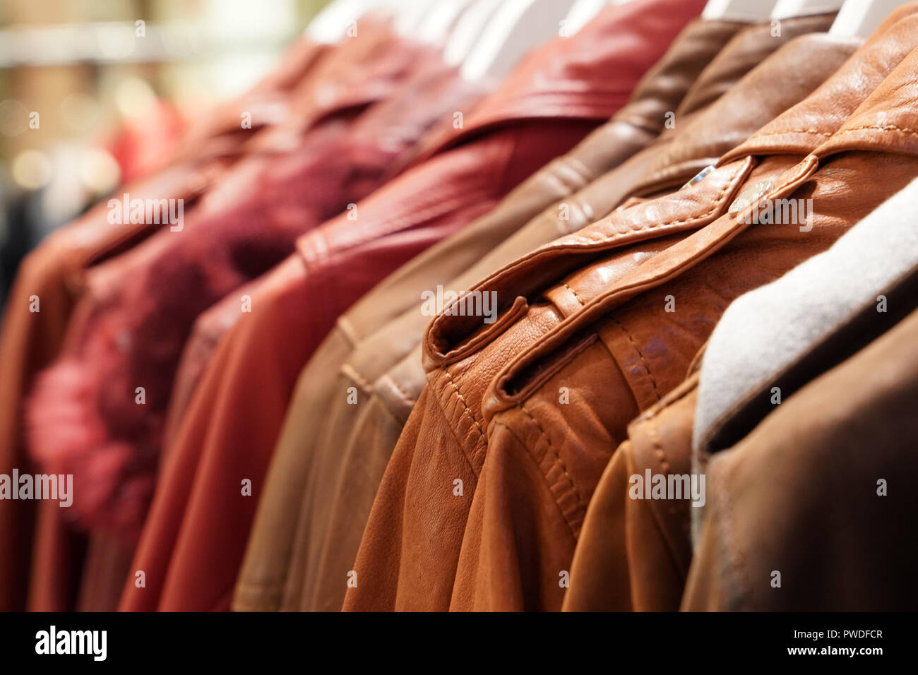 leather jackets on display for sale at shop market Stock Photo - Alamy