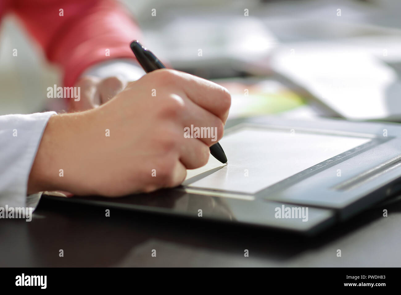 Designer working on graphics tablet hi-res stock photography and images ...