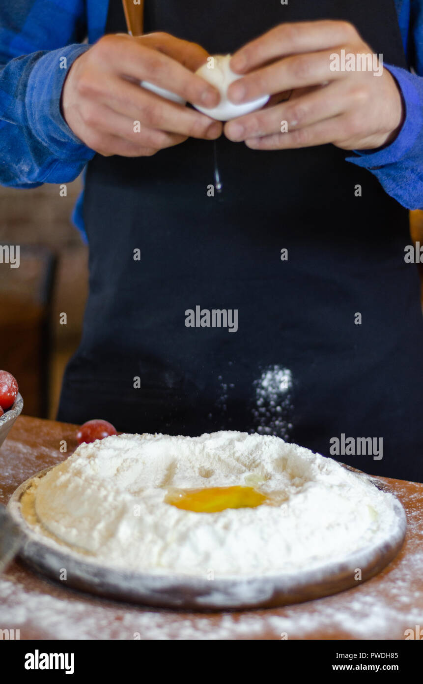 Making food egg breaking hi-res stock photography and images - Alamy