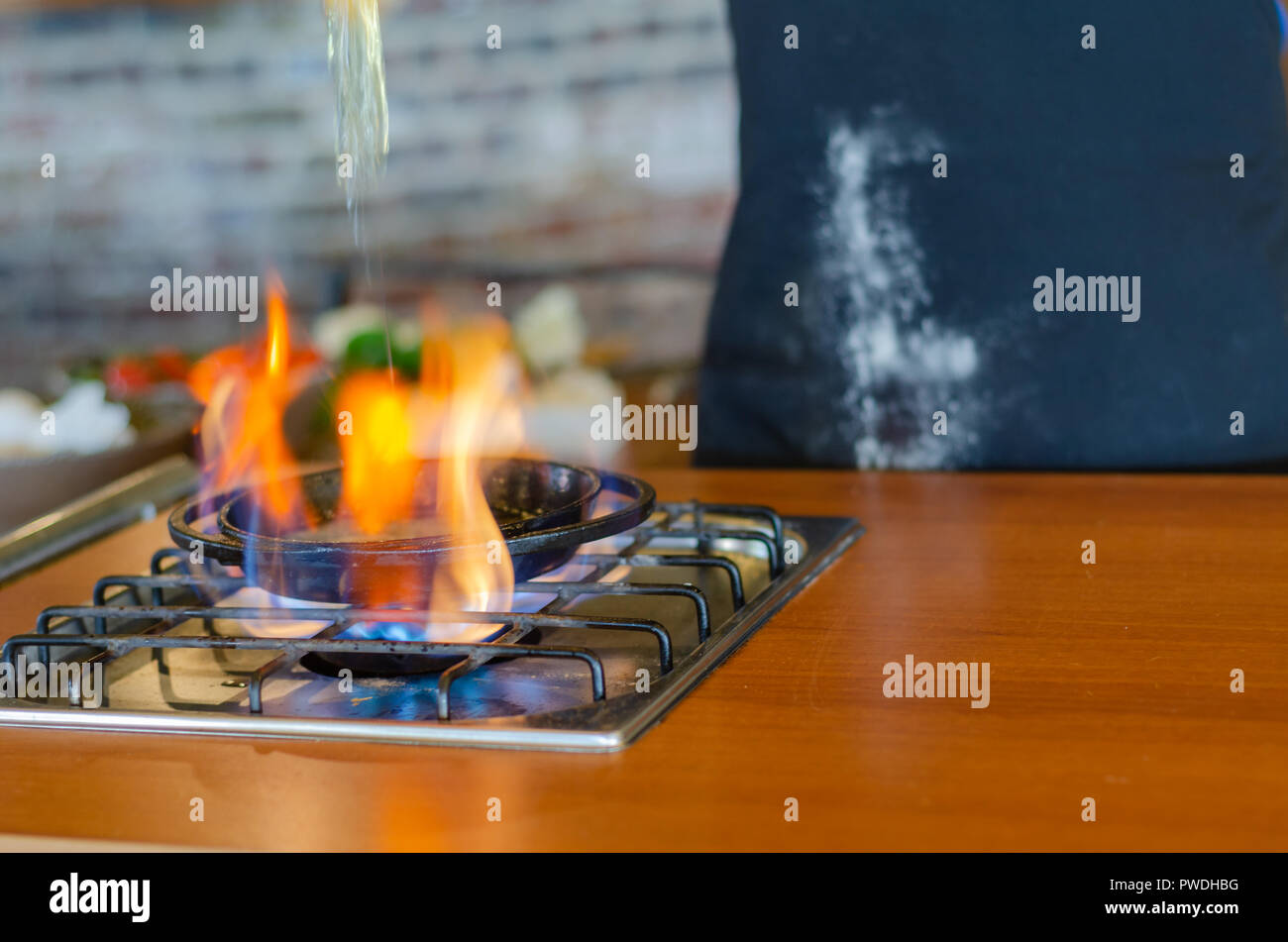 Frying egg stove pan flame hi-res stock photography and images - Alamy