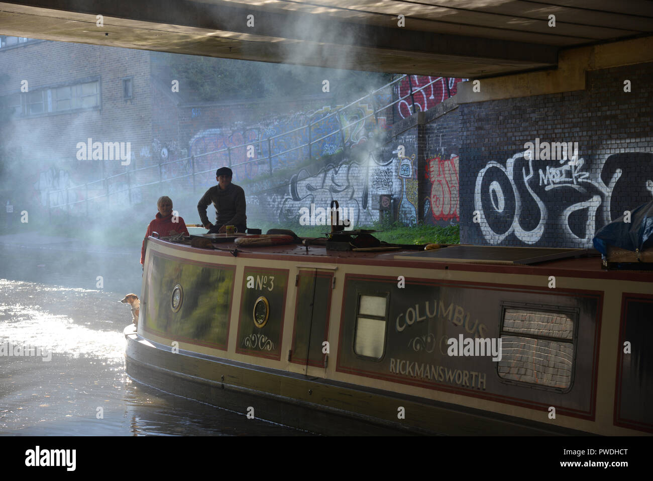 Narrowboat travelling on the Birmingham Canal as it passes under ...