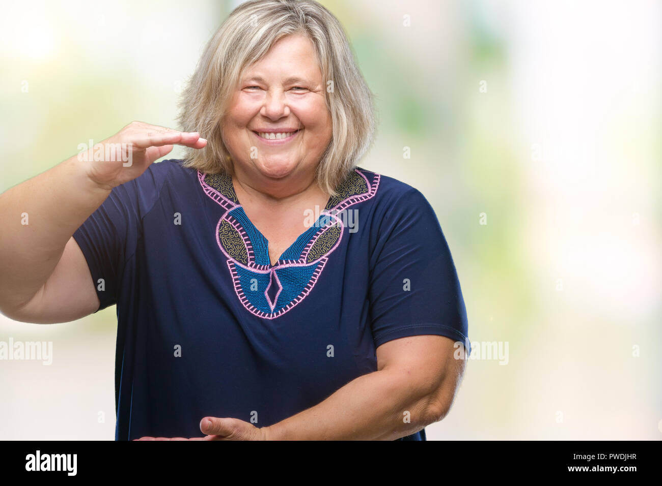 Senior plus size caucasian woman over isolated background gesturing ...