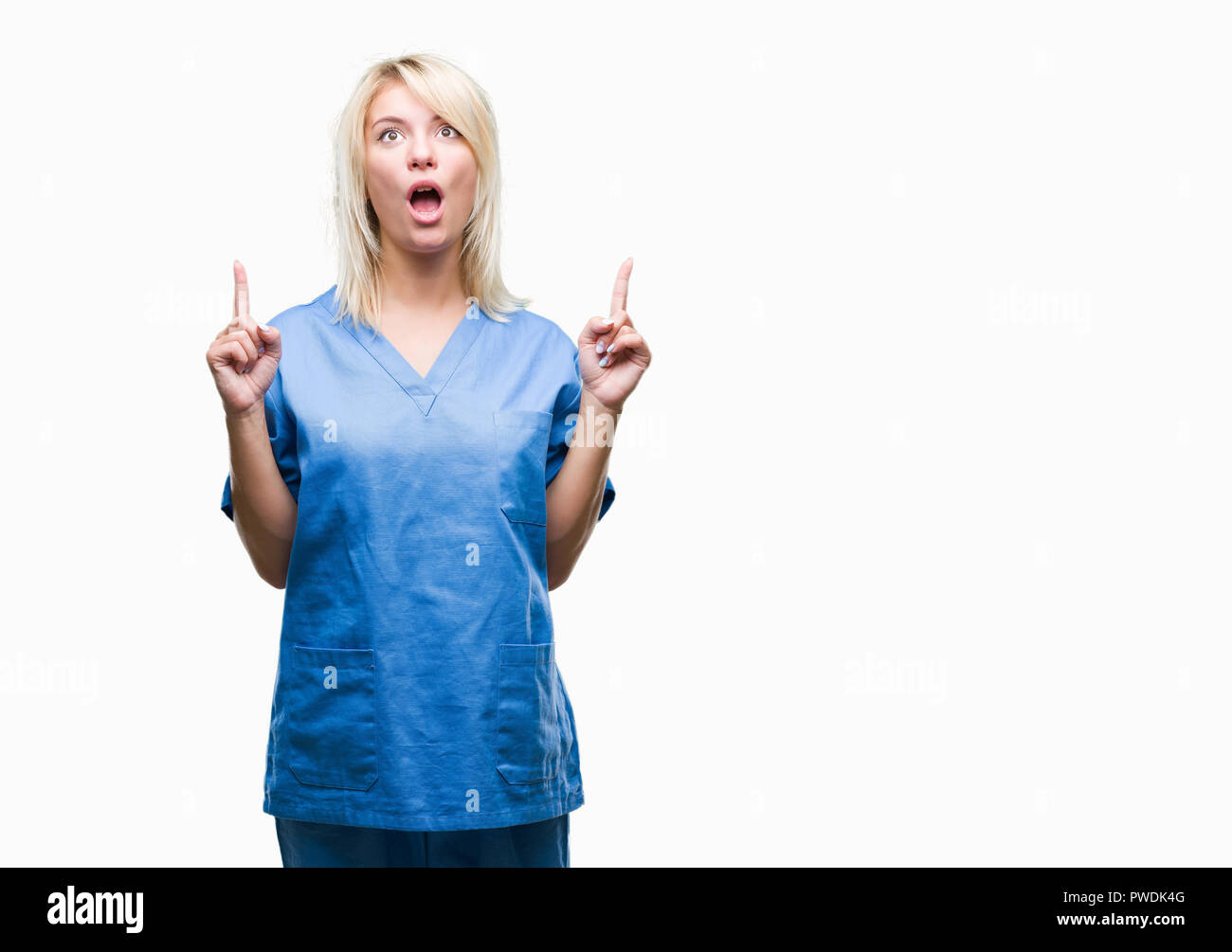 Young beautiful blonde nurse doctor woman over isolated background ...
