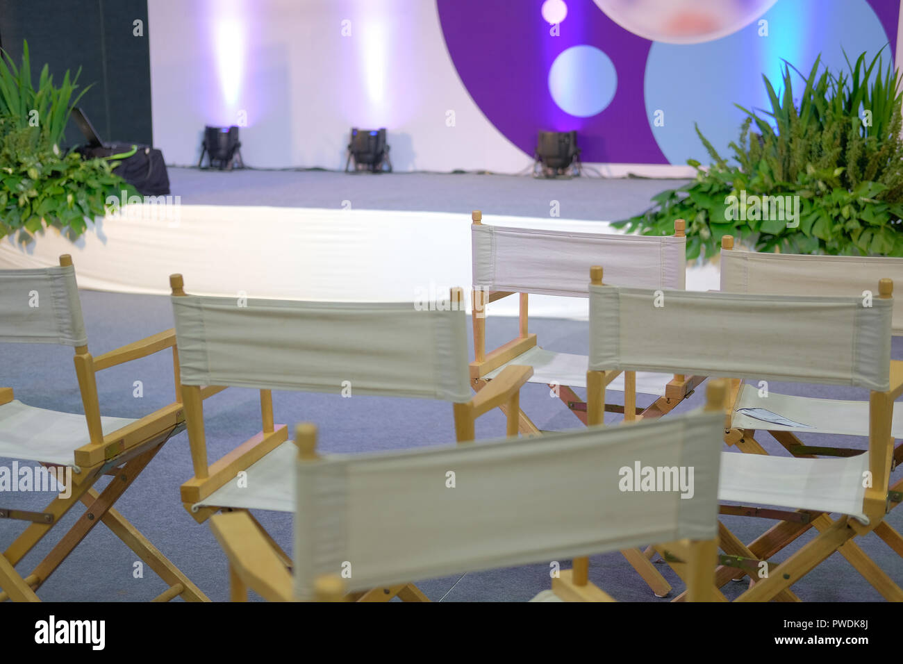 director audience chair & stage Stock Photo - Alamy