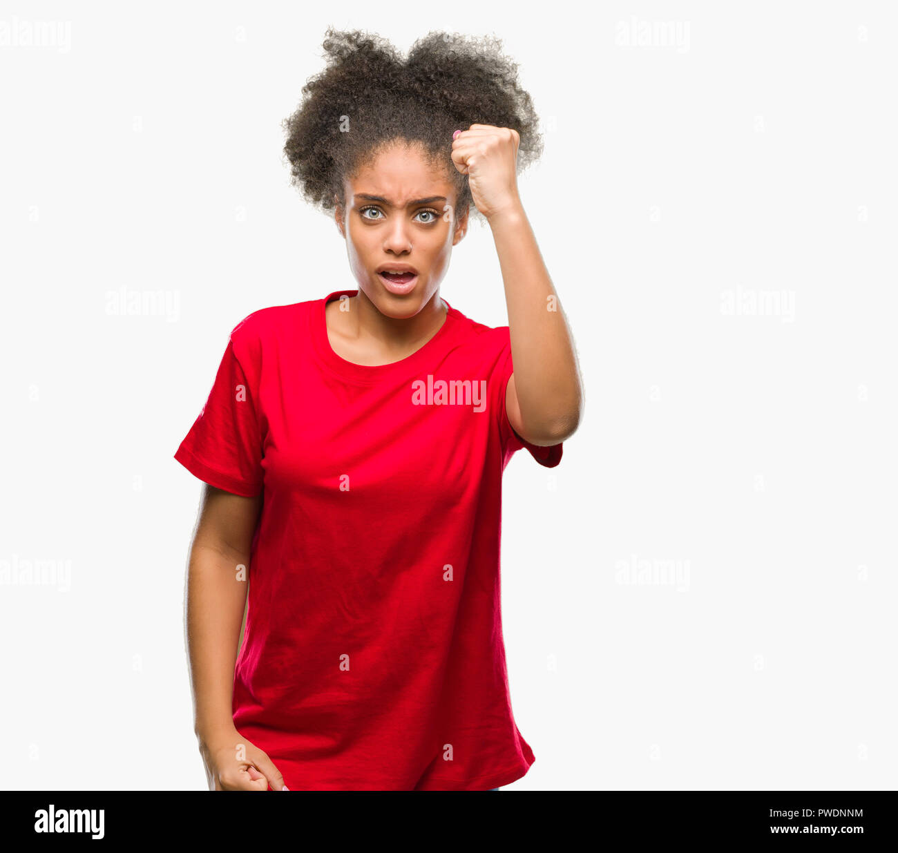 Young afro american woman over isolated background angry and mad ...