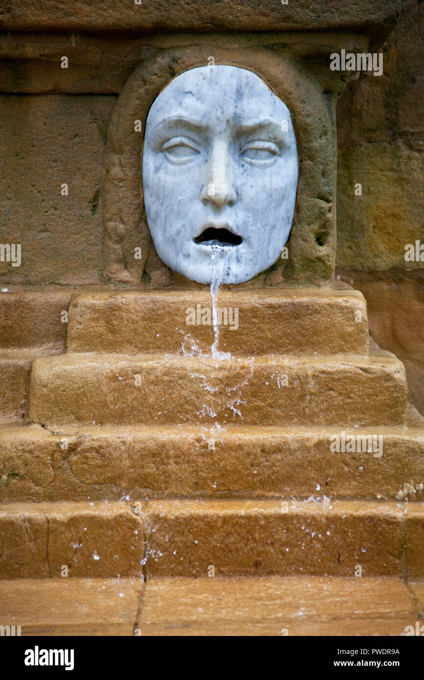 stone fountain sculpture of a face Stock Photo - Alamy