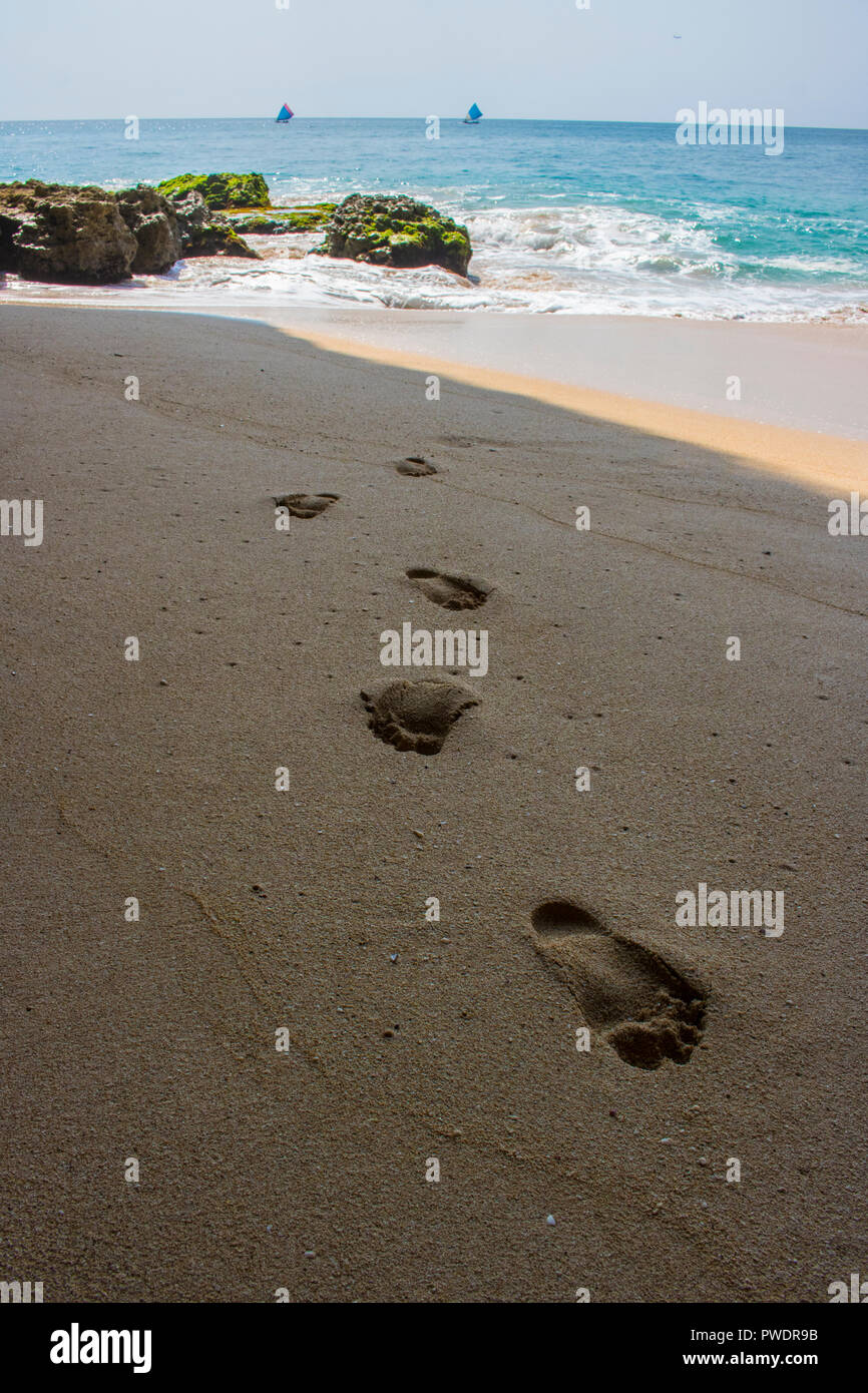 footprint on beach sand photo Stock Photo - Alamy