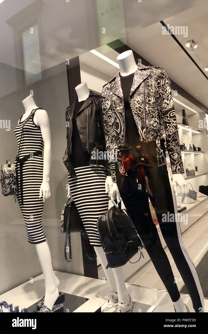 Fashion boutique display window with mannequins Stock Photo - Alamy