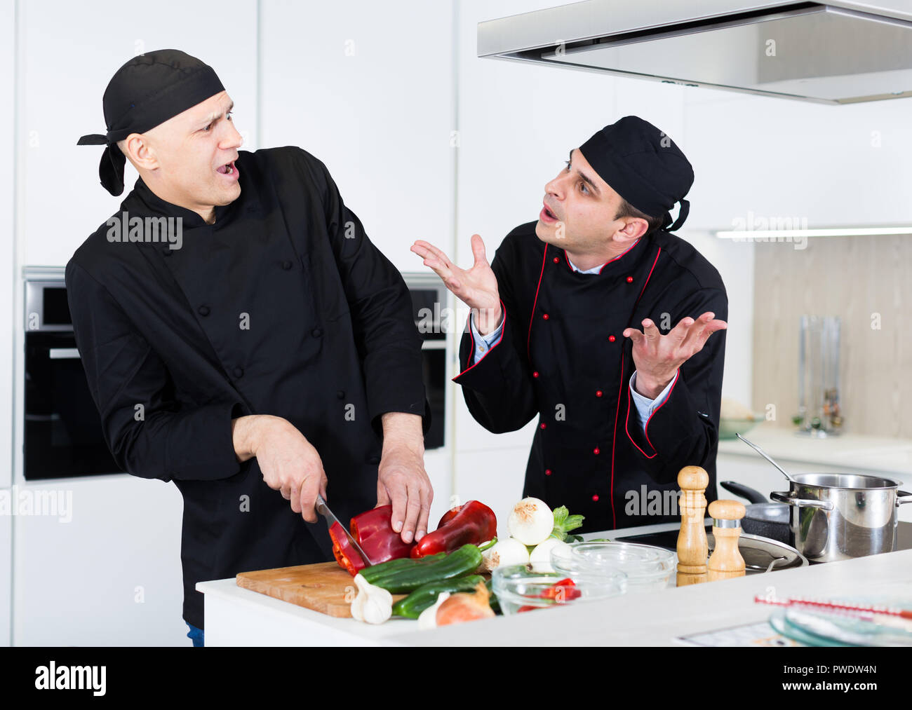 Two men arguing table hi-res stock photography and images - Alamy