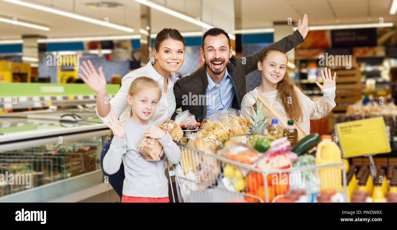 Portrait family with their children who are standing together in the ...