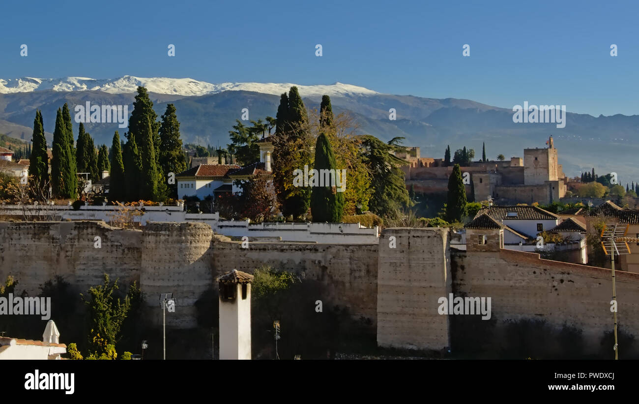 Side view on Alhambra moorish castle with Sierra Nevada mountains ...