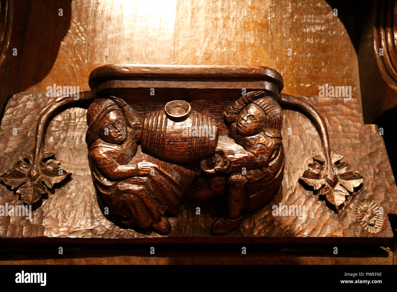 Misericords at St Marys church Fairford UK. Drunken scene Stock Photo ...