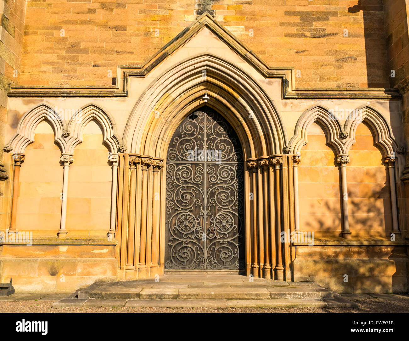 Arched ornate doorway with elaborate door, Victorian St Mary's ...