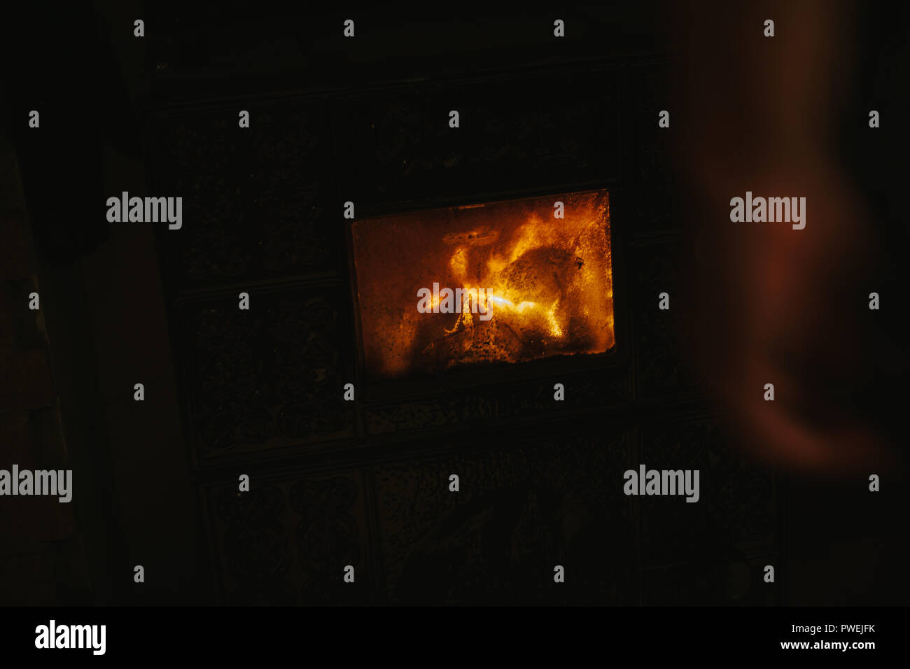 photo of the burning flames inside an oven Stock Photo - Alamy