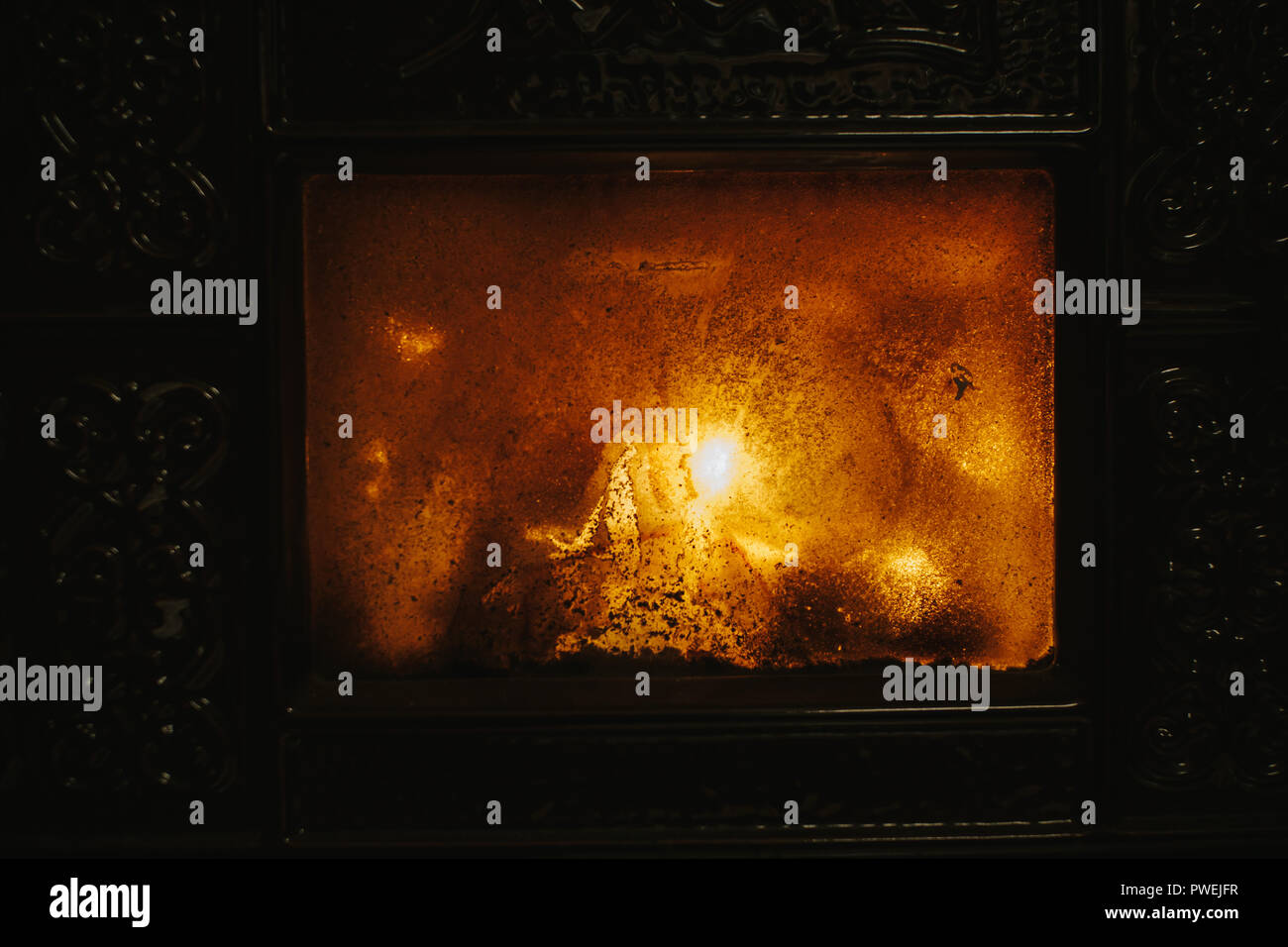 photo of the burning flames inside an oven Stock Photo - Alamy