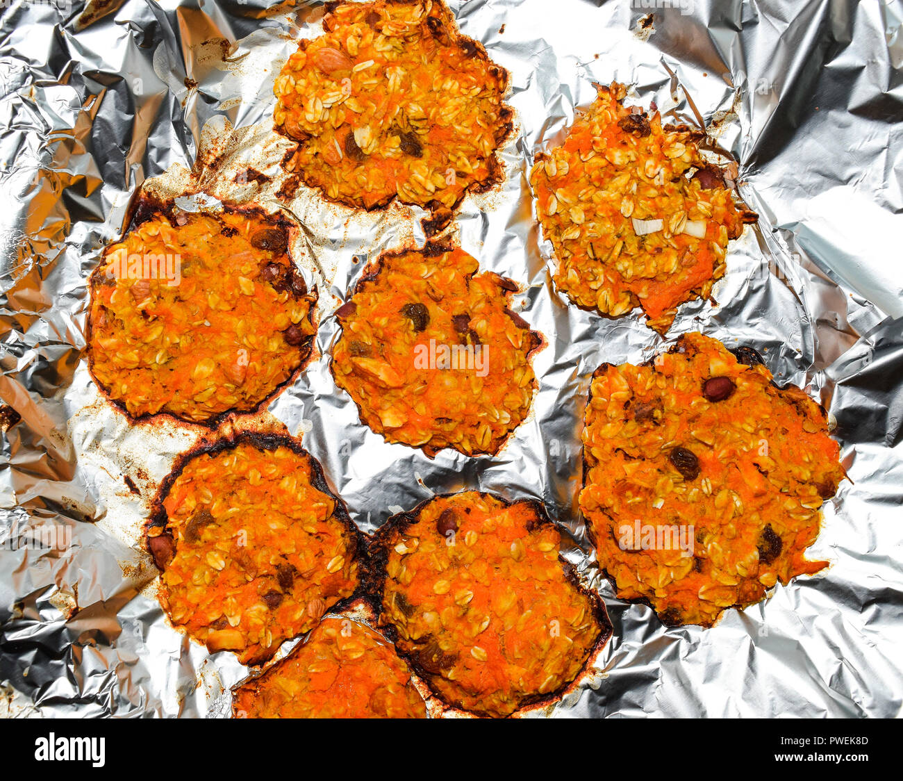 Baked in foil cakes from pumpkin and oatmeal Stock Photo - Alamy