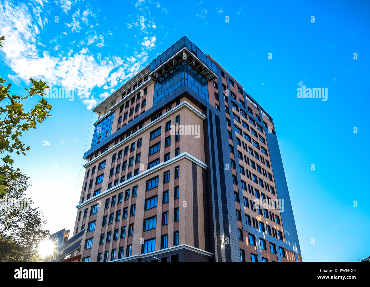 Office building, multi-storey building. Building against the blue sky ...