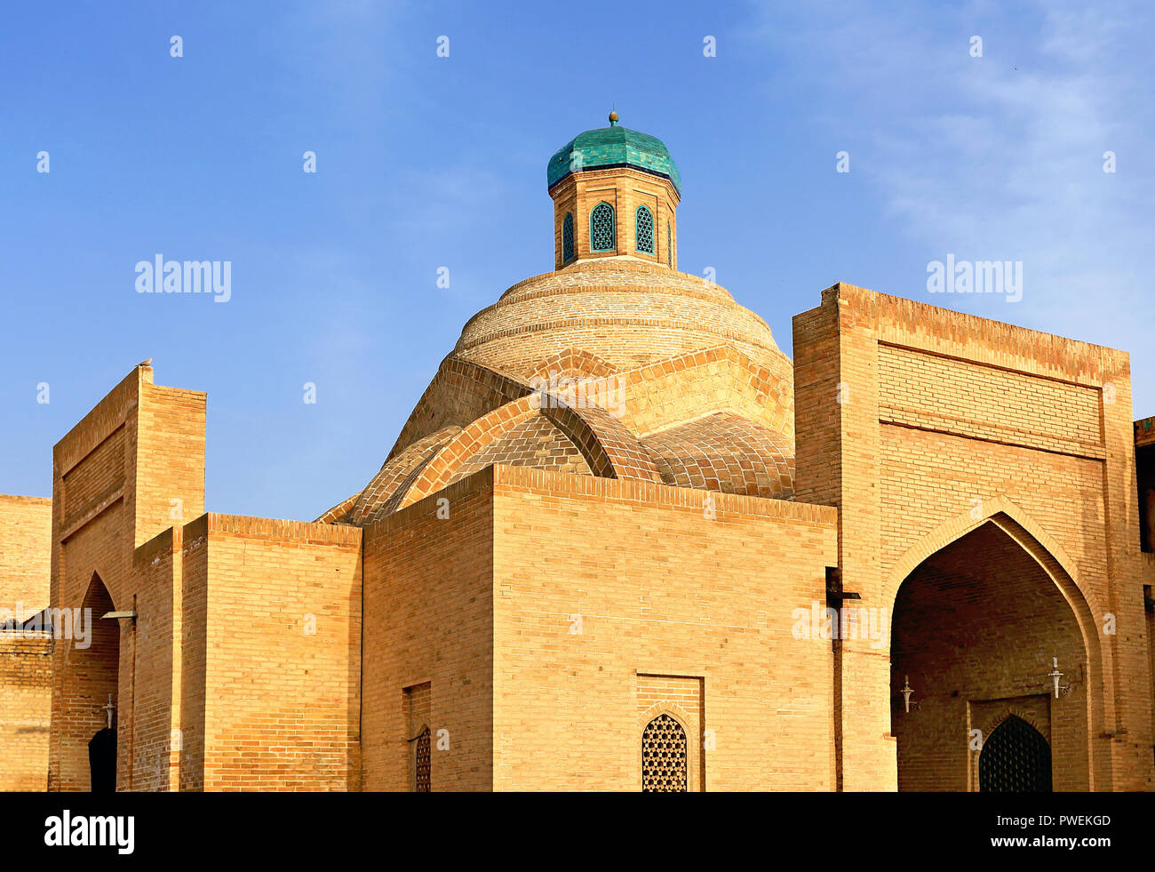 Old-time central asian building with gate, dome and small turret Stock ...