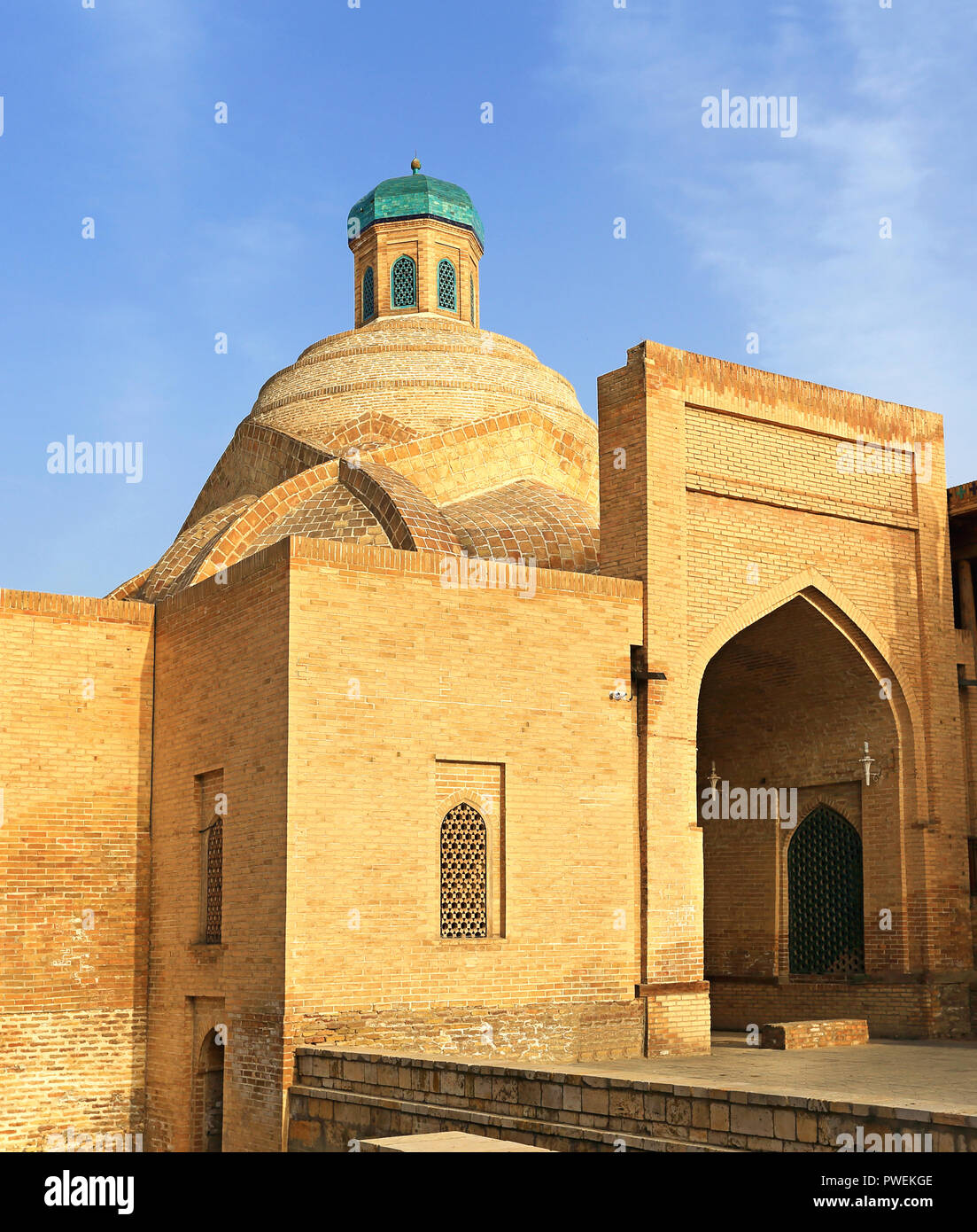 Old-time central asian building with gate, dome and small turret Stock ...