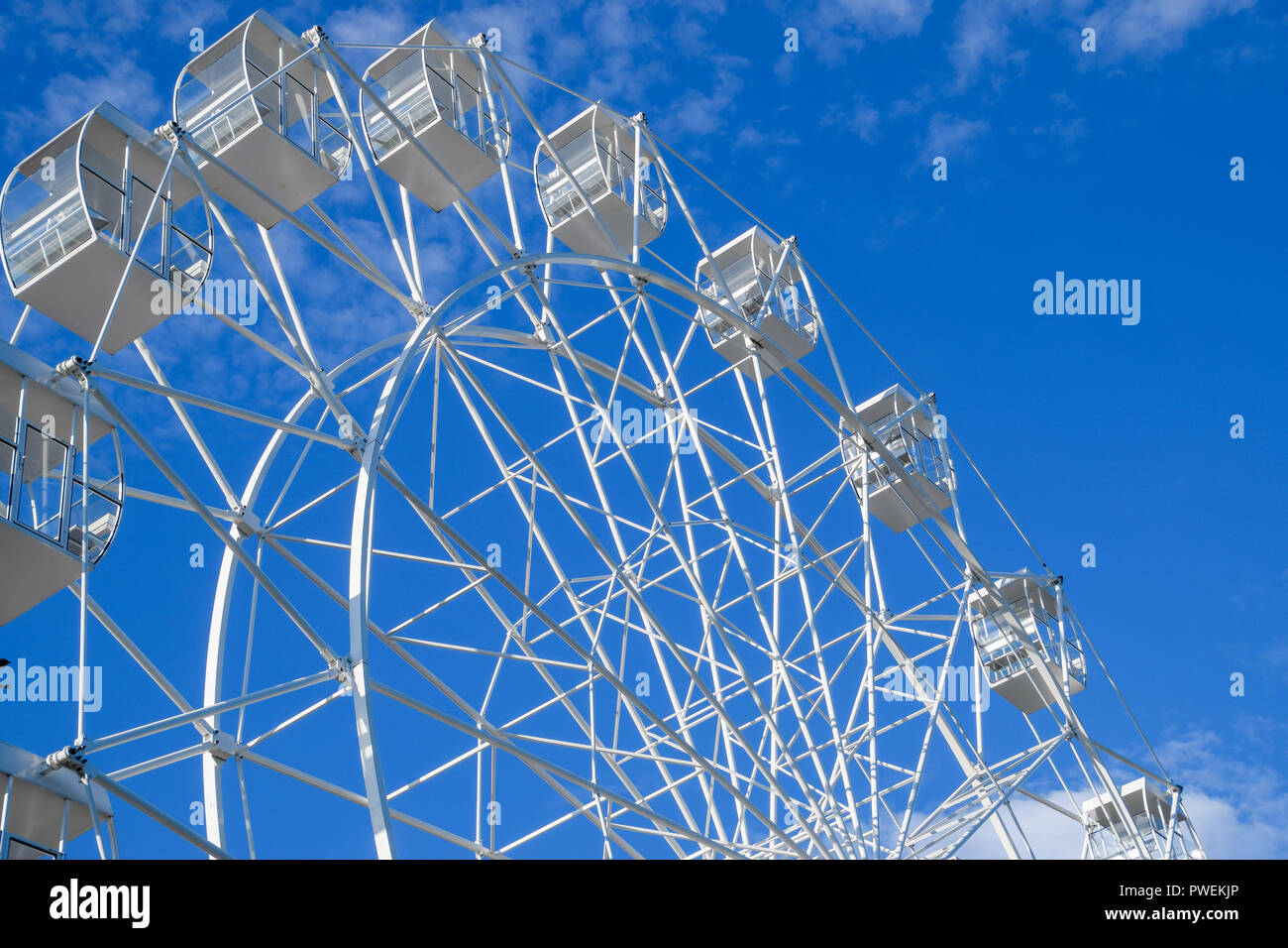 White ferris wheel against the blue sky. Ferris wheel in the park Stock ...