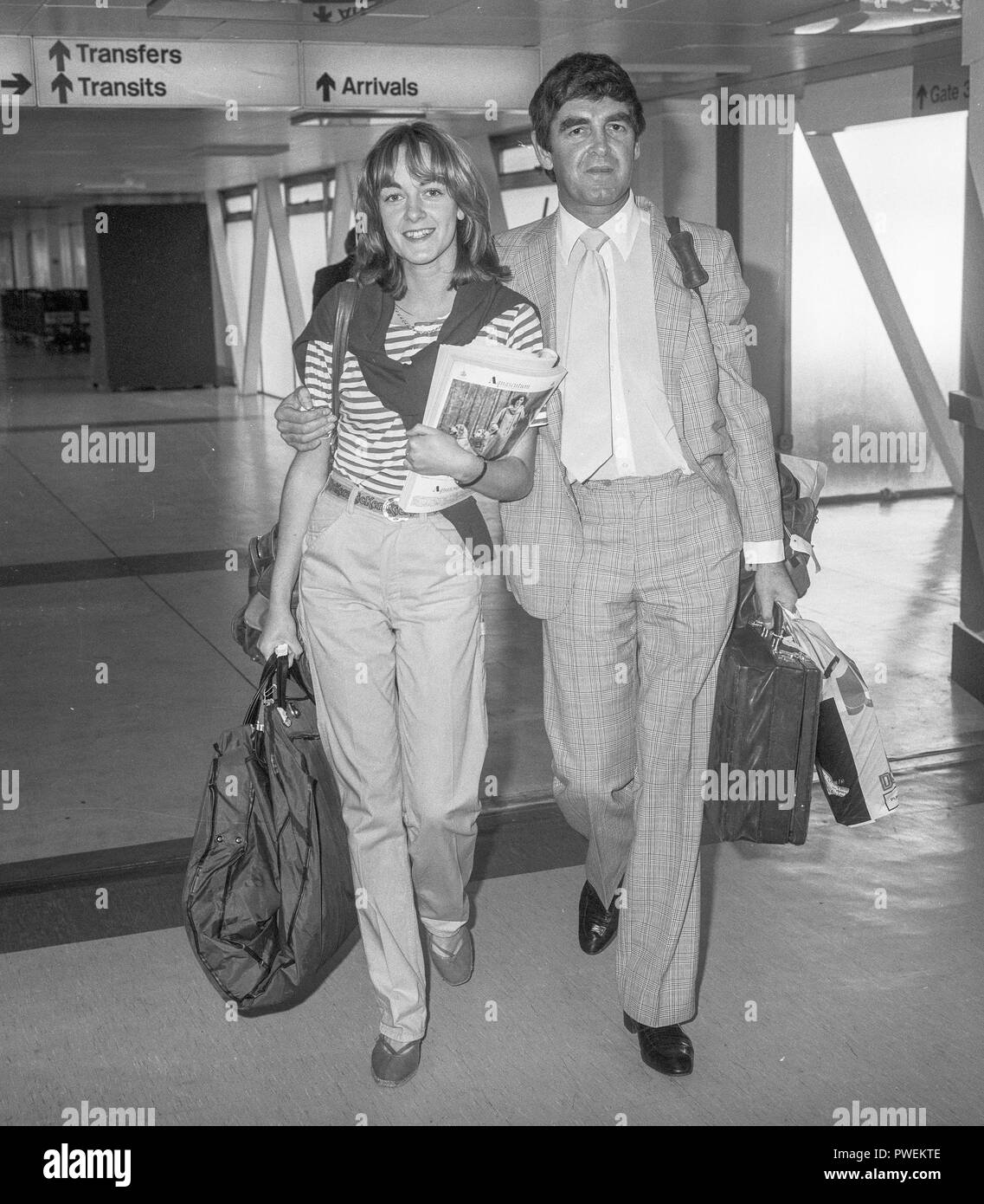 Derek Nimmo and daughter Amanda arriving at Heathrow Airport 1979 Stock ...