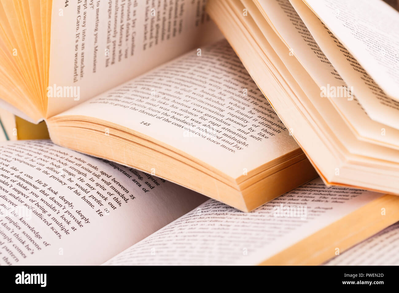 Opened books close up picture Stock Photo - Alamy