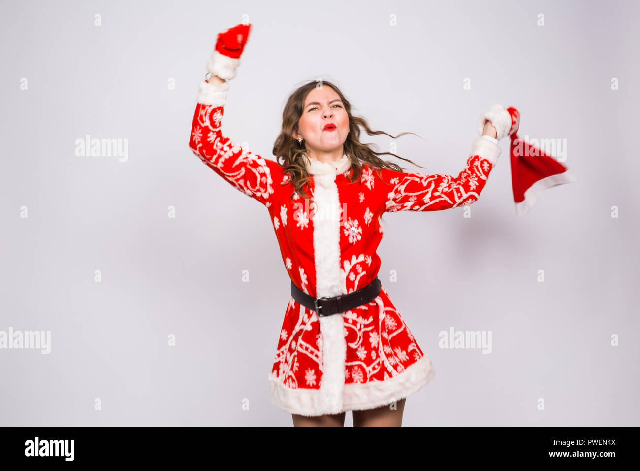 Christmas, emotions and holidays concept - excited shouting woman in ...