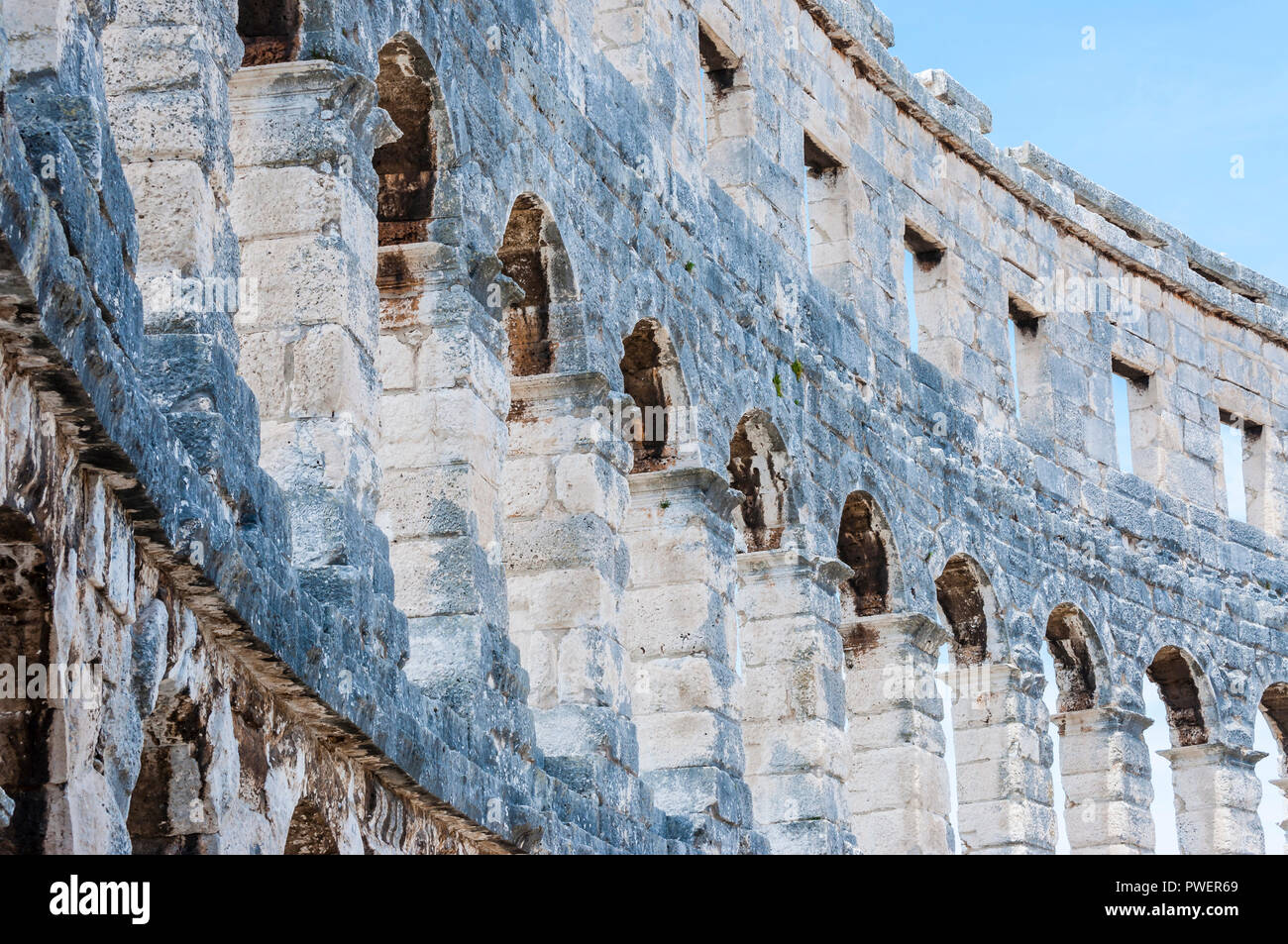 Pula, Croatia - June 18, 2014: Stone arc columns rows in Pula Arena ...