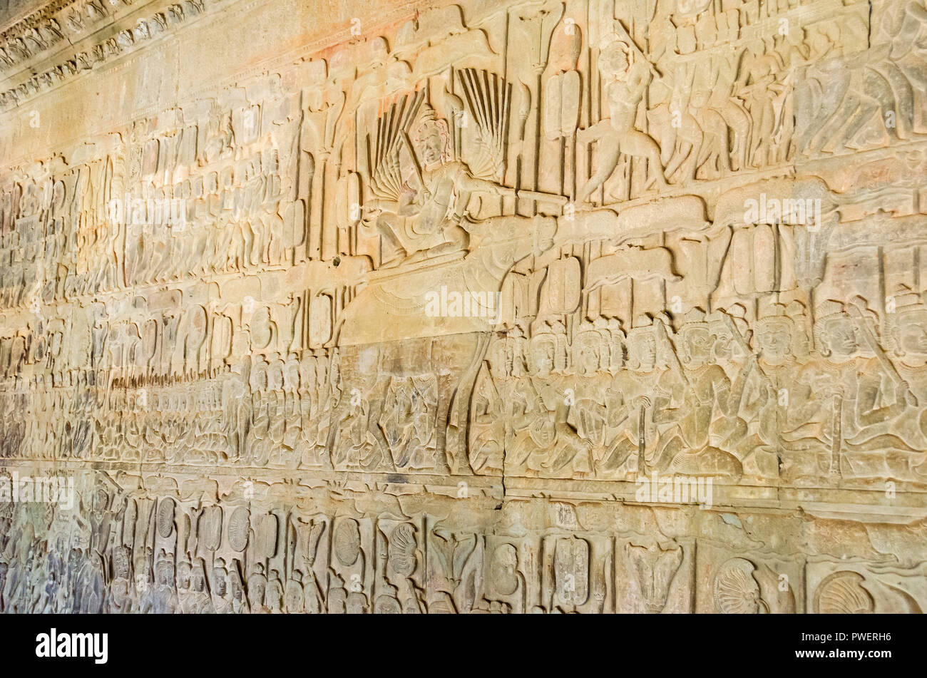 The wall of one of the galleries of Angkor Wat with its linear ...