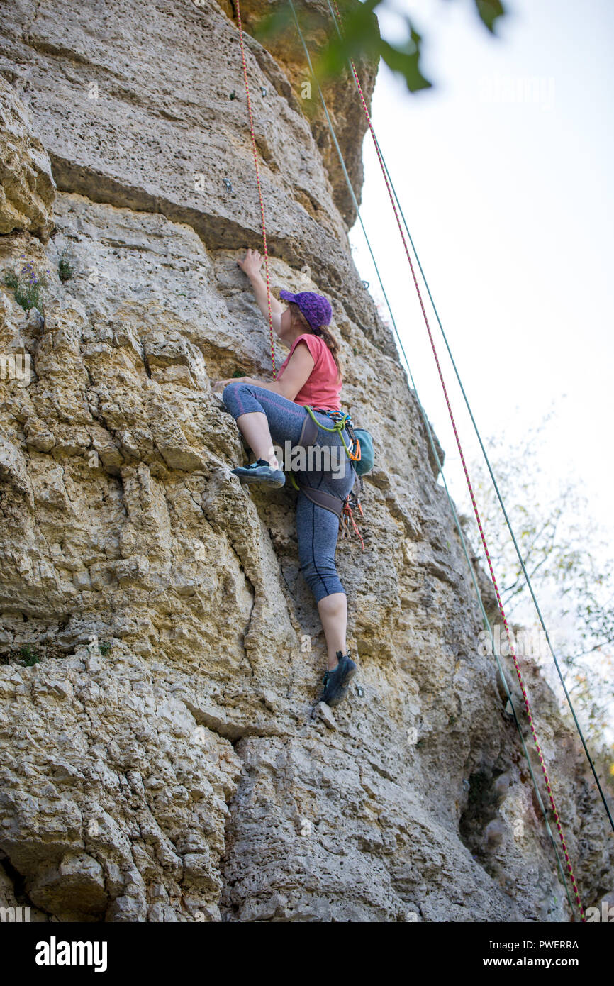 Photo of sports woman climbing mountain Stock Photo - Alamy