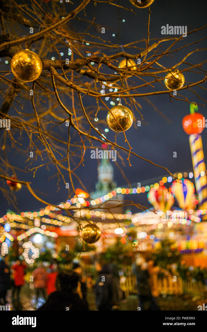 Picture of tree with golden balls on background of building Stock Photo ...