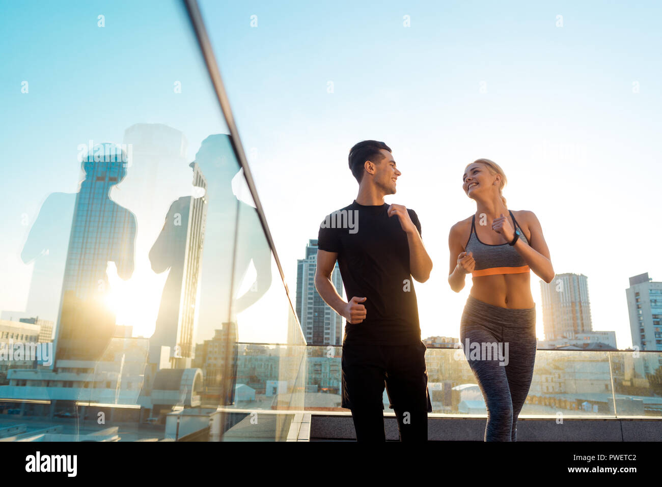 Happy couple enjoy jogging Stock Photo - Alamy