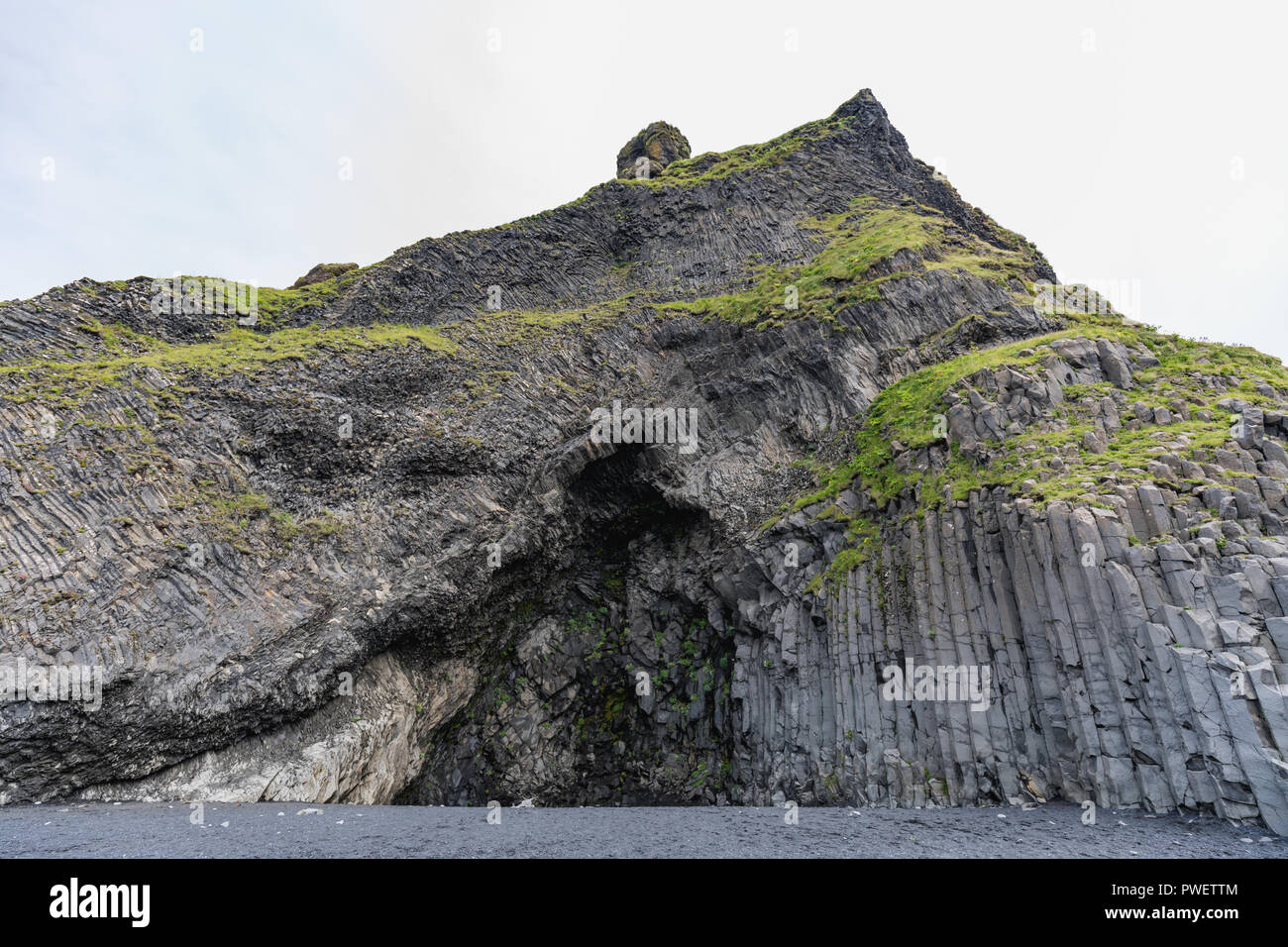 strange stone structures on the black beach reynisfjara in iceland ...