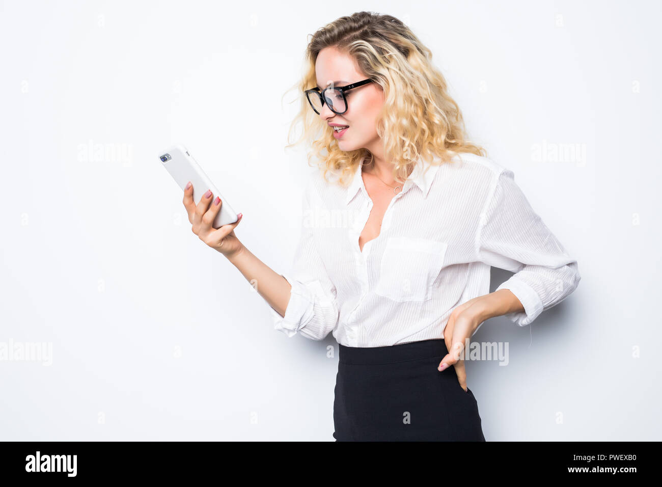 Happy Smiling Successful Businesswoman With Cell Phone Isolated On