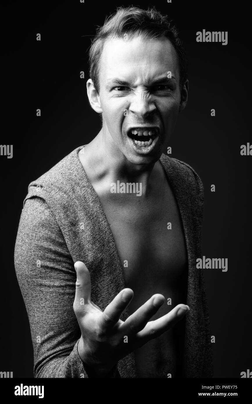 Serious angry man in Black and White Stock Photos & Images - Alamy