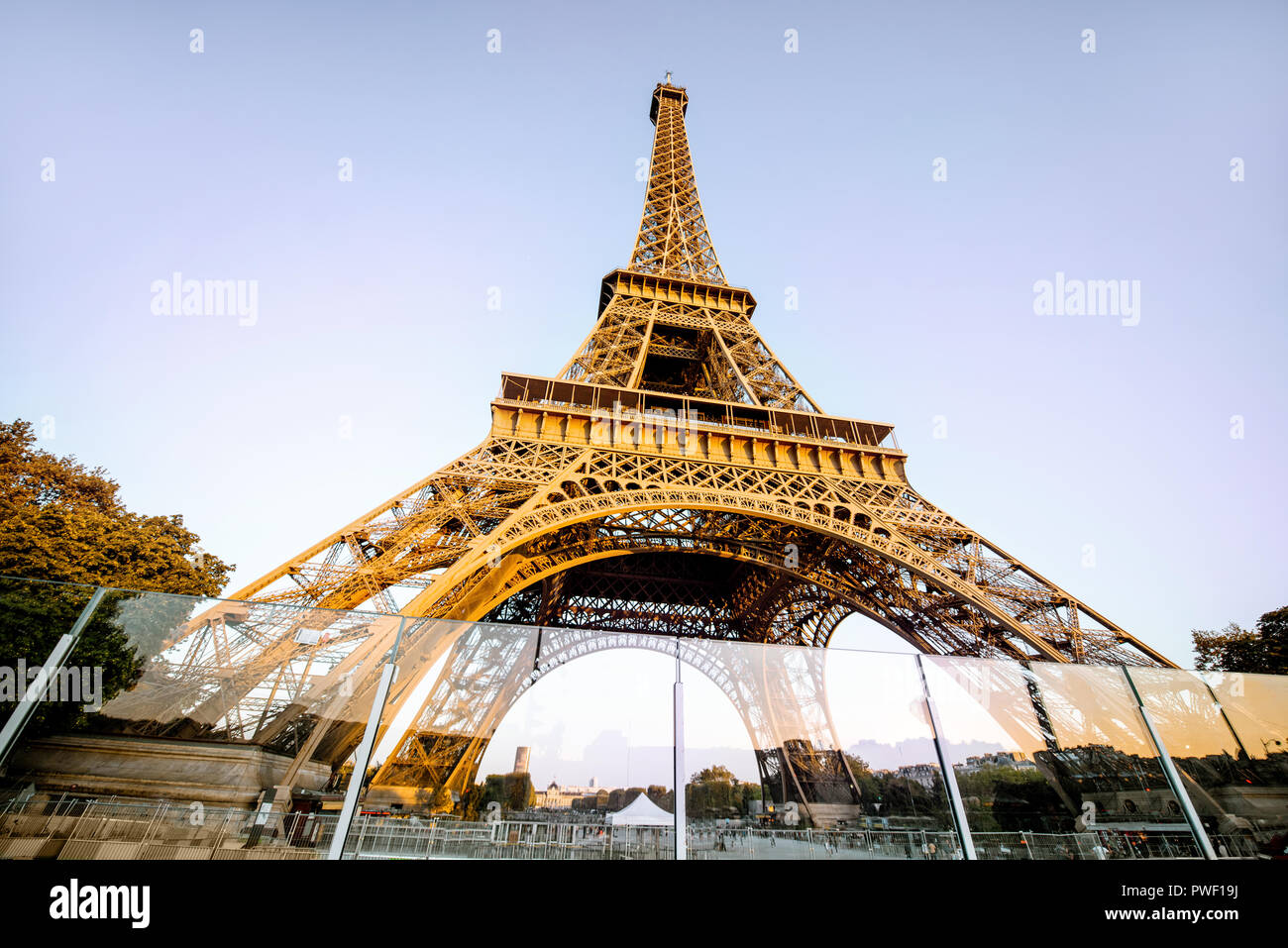 View from below on Eiffel tower during the sunset in Paris Stock Photo ...