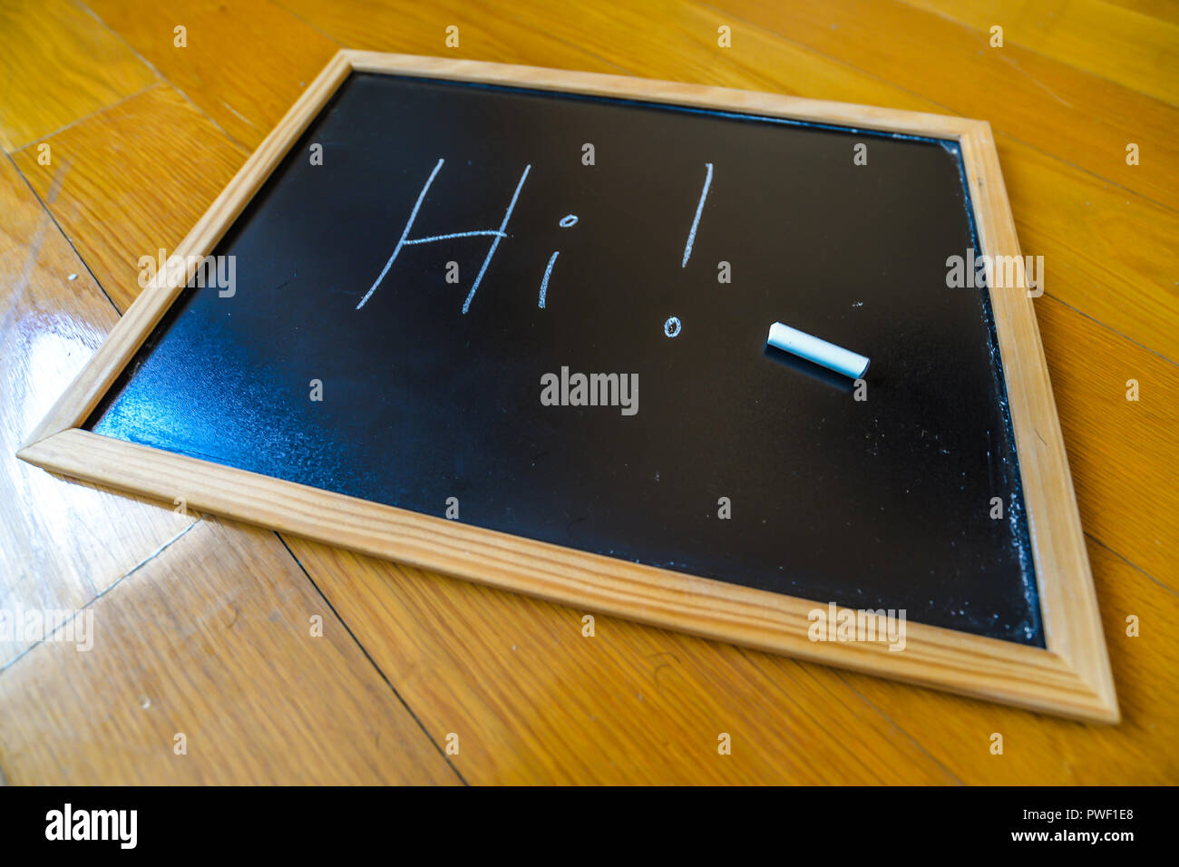 Hi written on a chalk board Stock Photo - Alamy