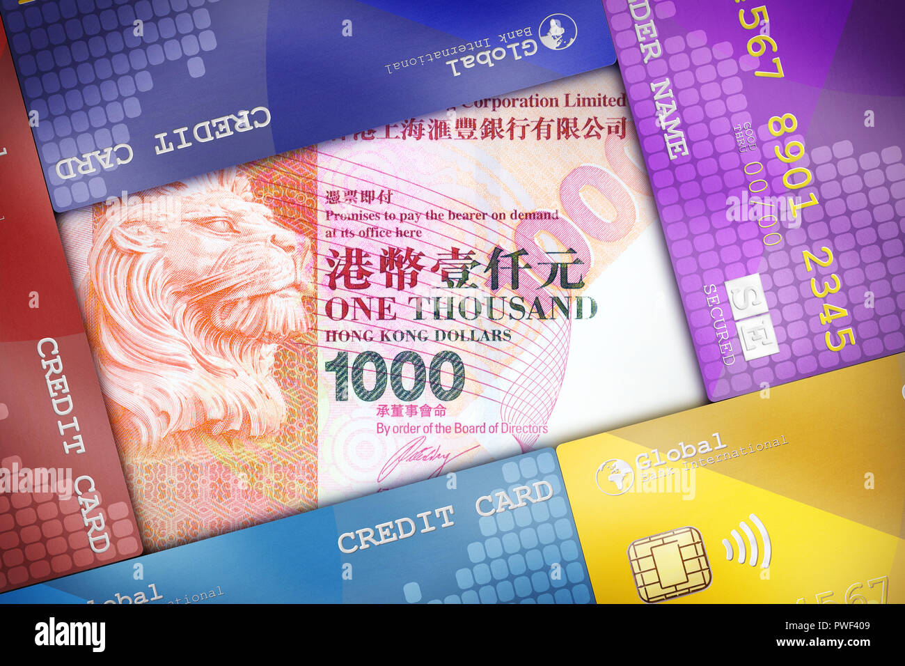 Credit Cards beautifully arranged to cover a money bill symbolizing ...