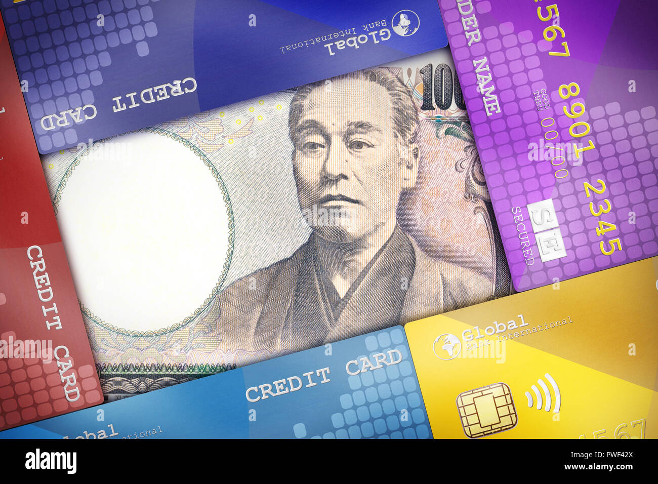 Credit Cards beautifully arranged to cover a money bill symbolizing ...