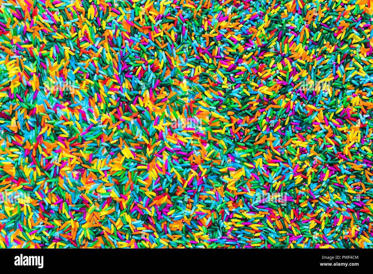 A Colorful rice grain background Stock Photo - Alamy