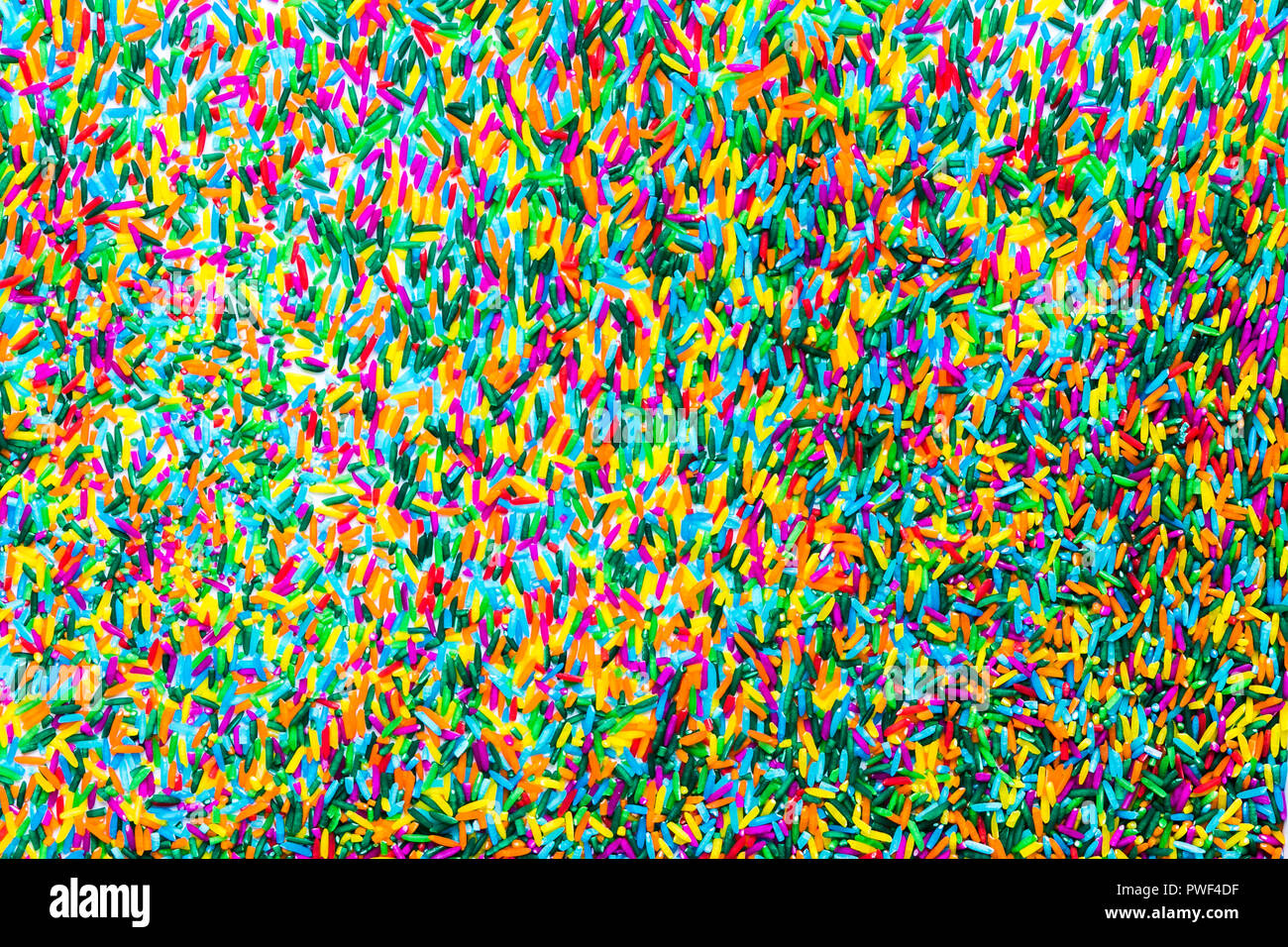 A Colorful rice grain background Stock Photo - Alamy